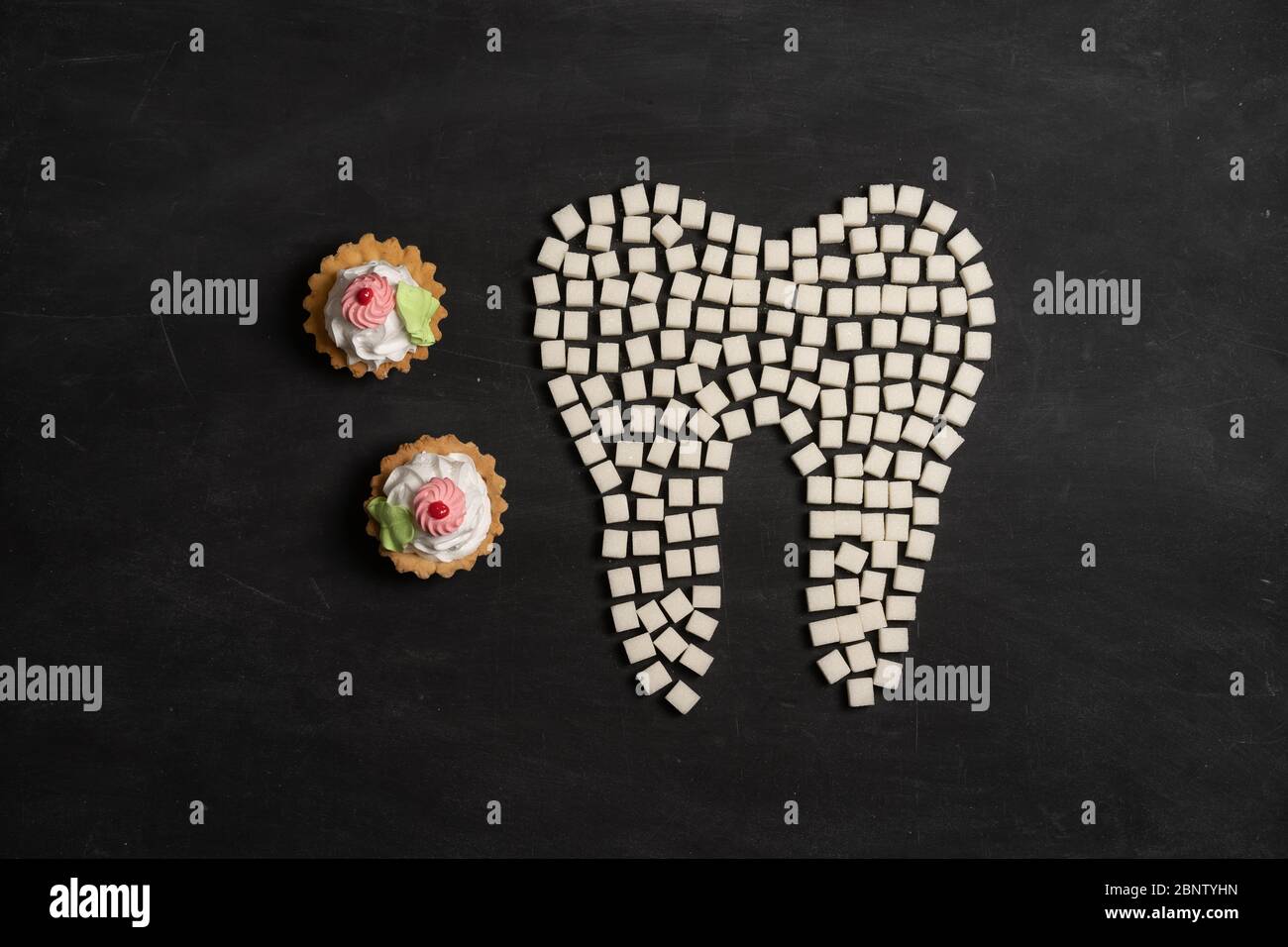 Sugar destroy tooth enamel leads tooth decay White Sugar cubes shape ...