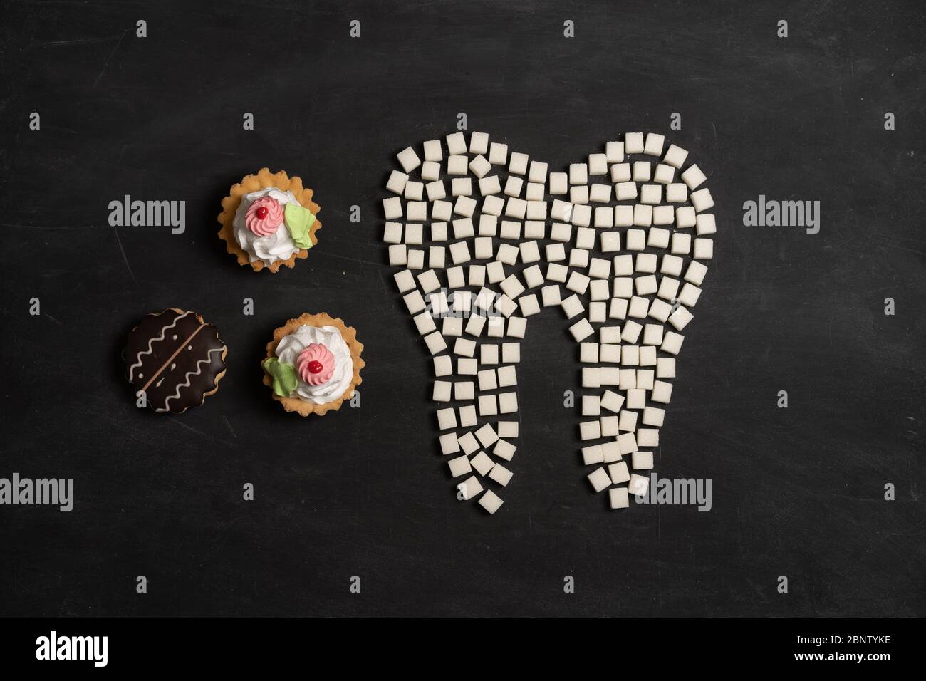 Sugar destroy tooth enamel leads tooth decay White Sugar cubes shape ...