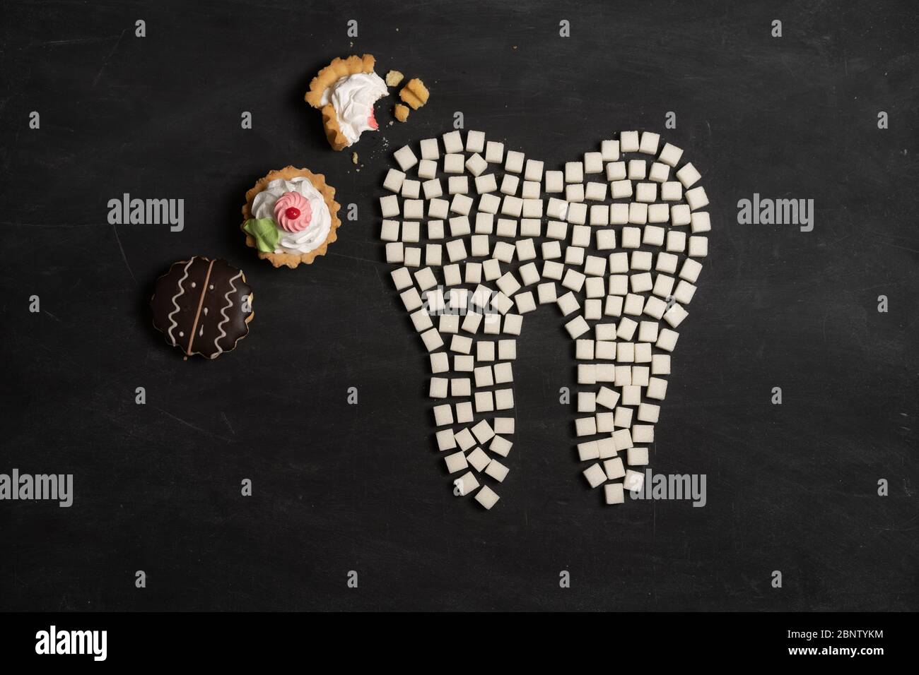 Sugar destroy tooth enamel leads tooth decay White Sugar cubes shape ...