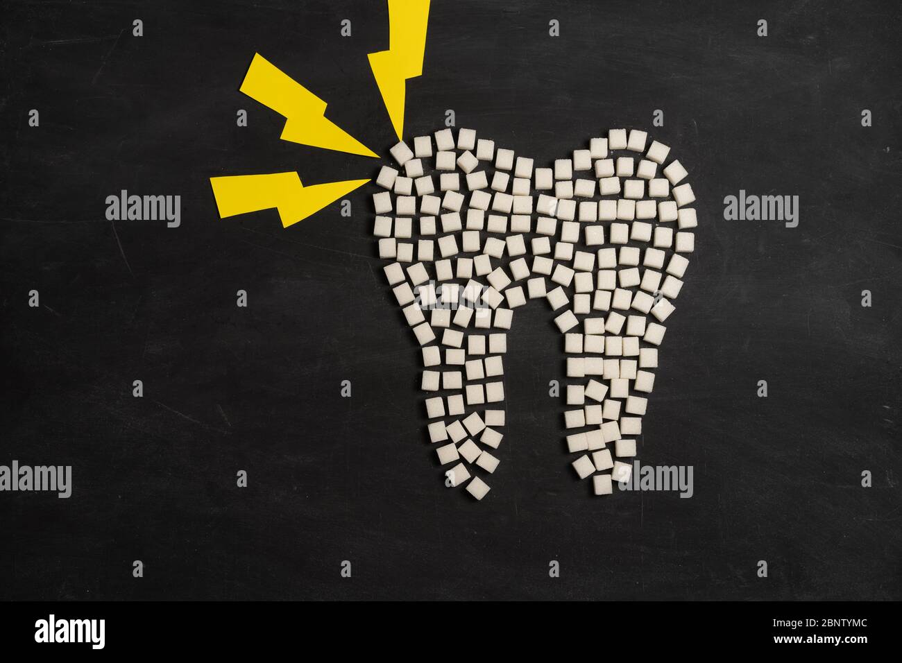 Sugar destroy tooth enamel leads tooth decay White Sugar cubes shape ...