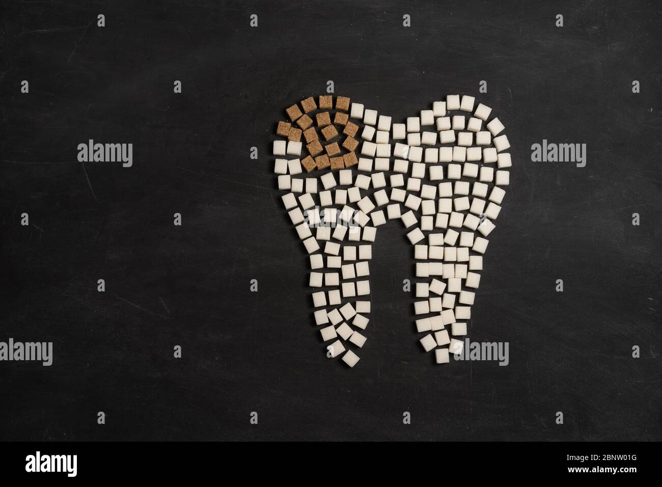 Sugar destroy tooth enamel leads tooth decay White Sugar cubes shape ...