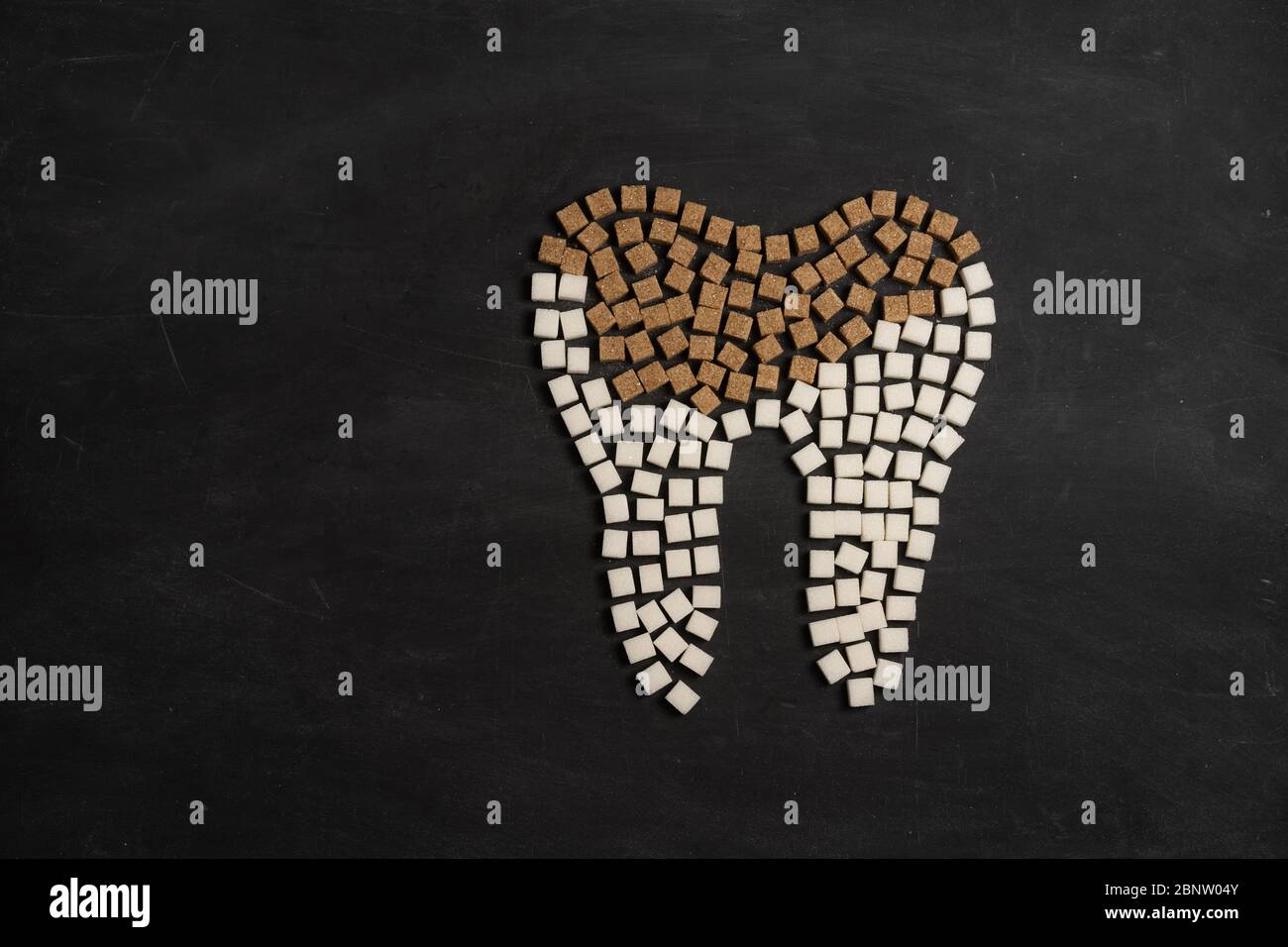 Sugar destroy tooth enamel leads tooth decay White Sugar cubes shape ...