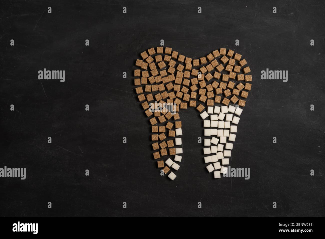 Sugar destroy tooth enamel leads tooth decay White Sugar cubes shape ...