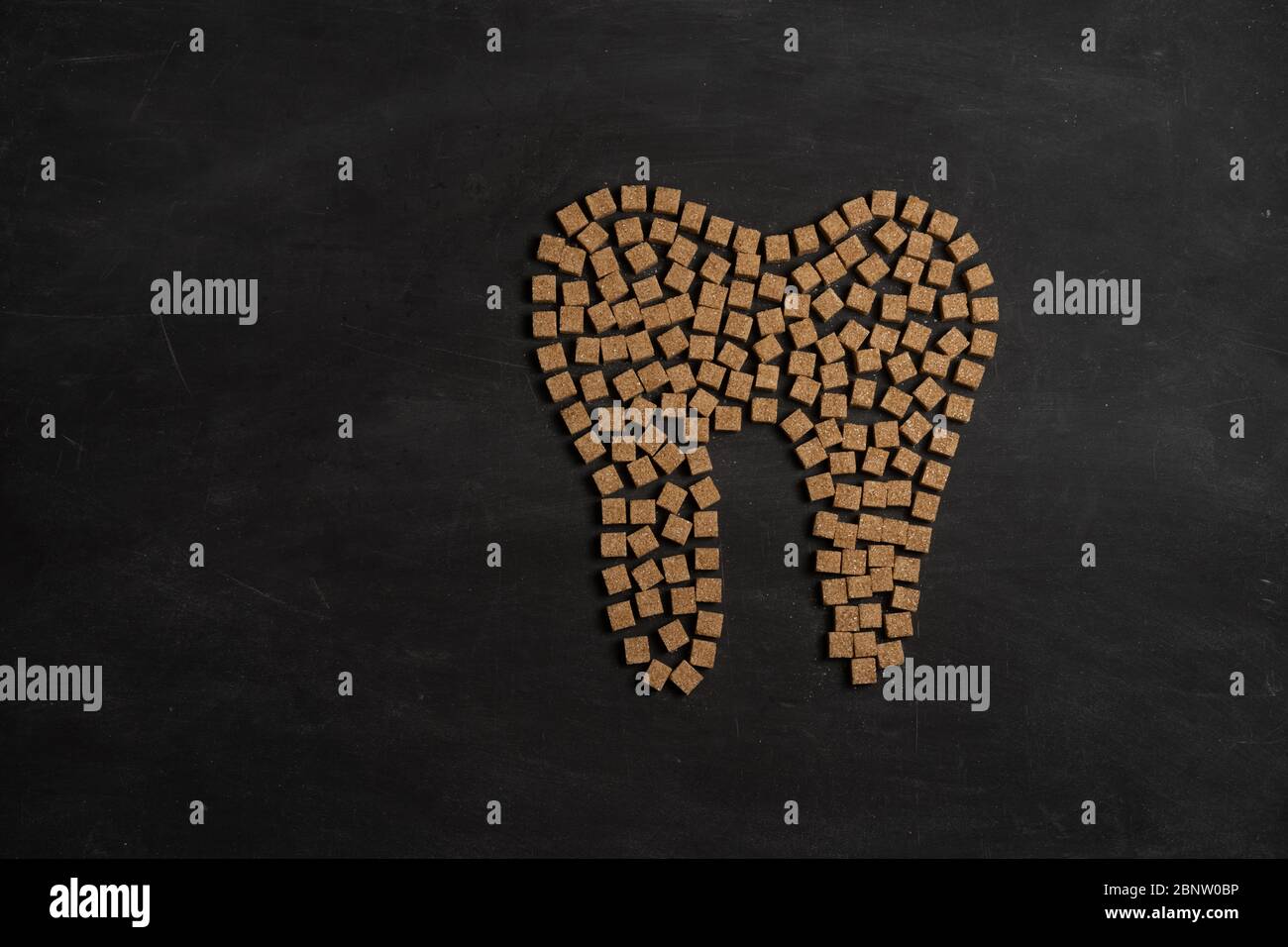 Sugar destroy tooth enamel leads tooth decay White Sugar cubes shape ...