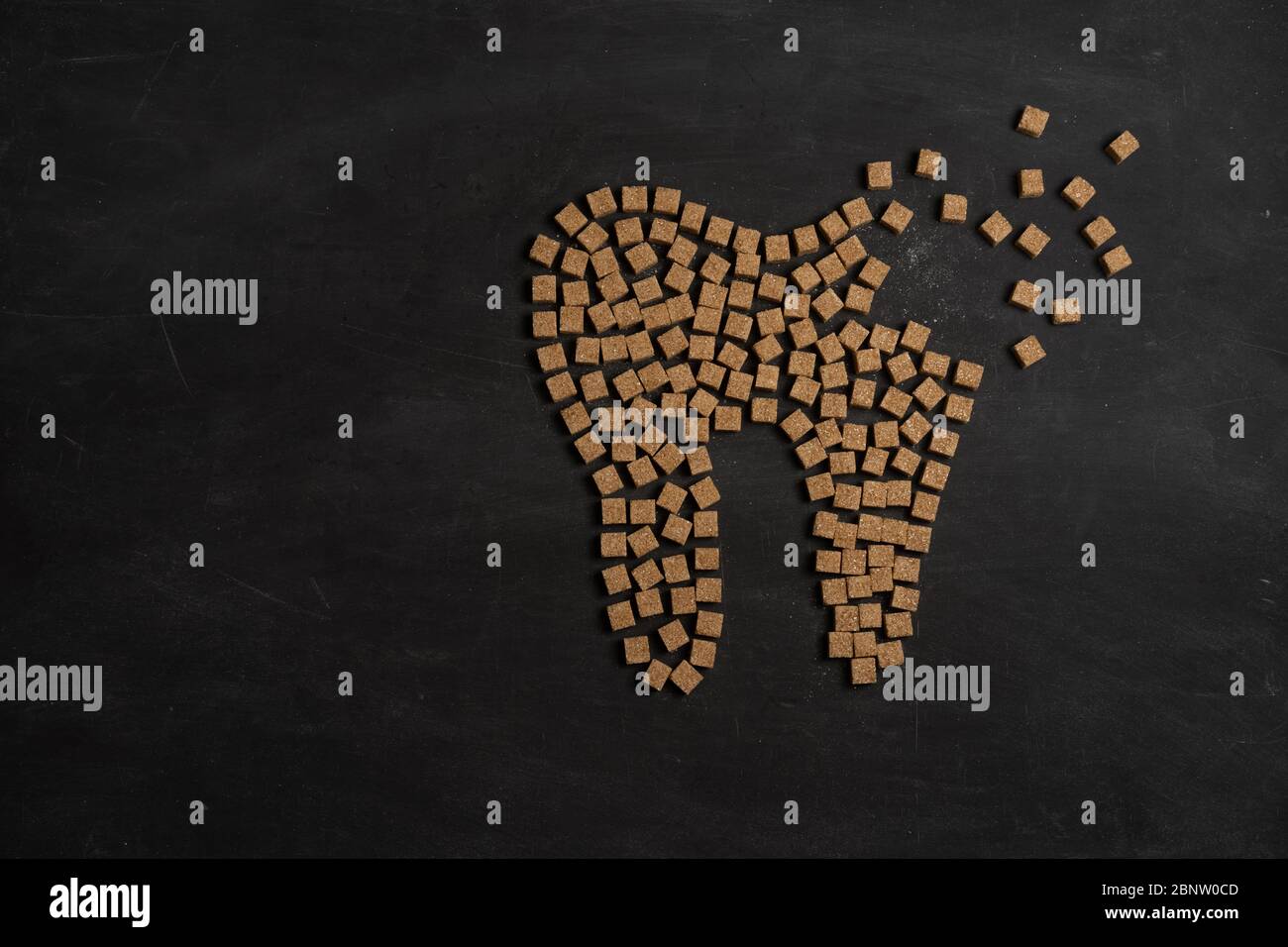 Sugar destroy tooth enamel leads tooth decay White Sugar cubes shape ...
