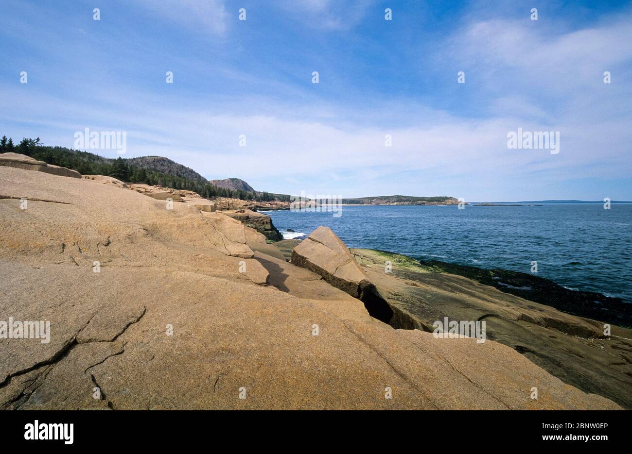 The rocky shoreline of Acadia National Park on Mount Desert Island in ...