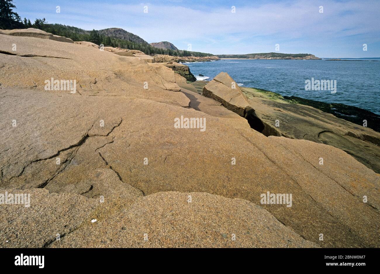 The rocky shoreline of Acadia National Park on Mount Desert Island in ...