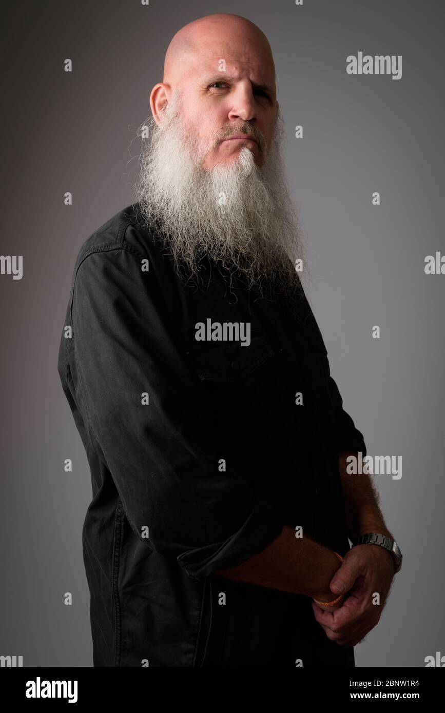 Mature bald hipster man hi-res stock photography and images - Alamy