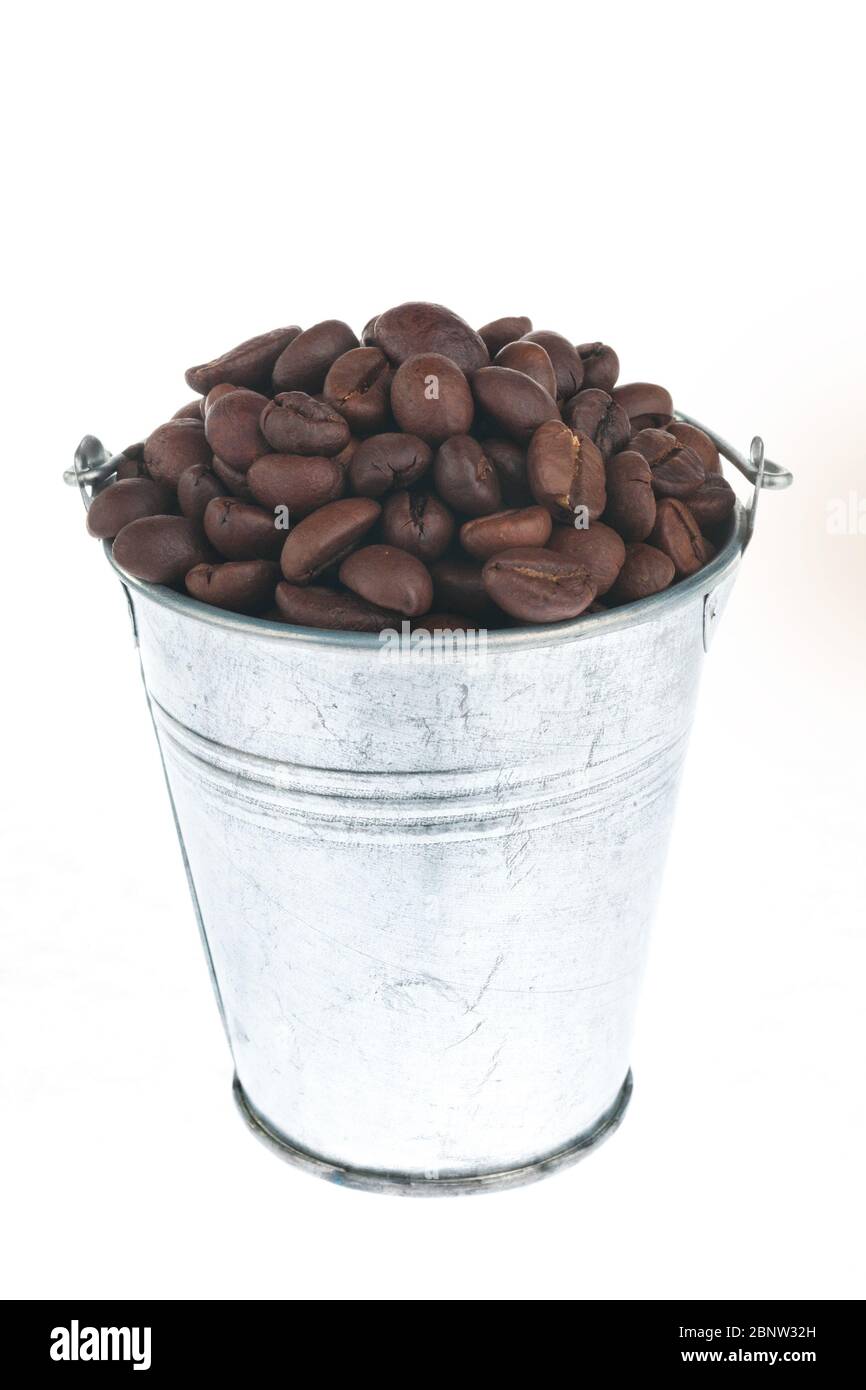 Full bucket of coffee beans on a white background. With place for text ...