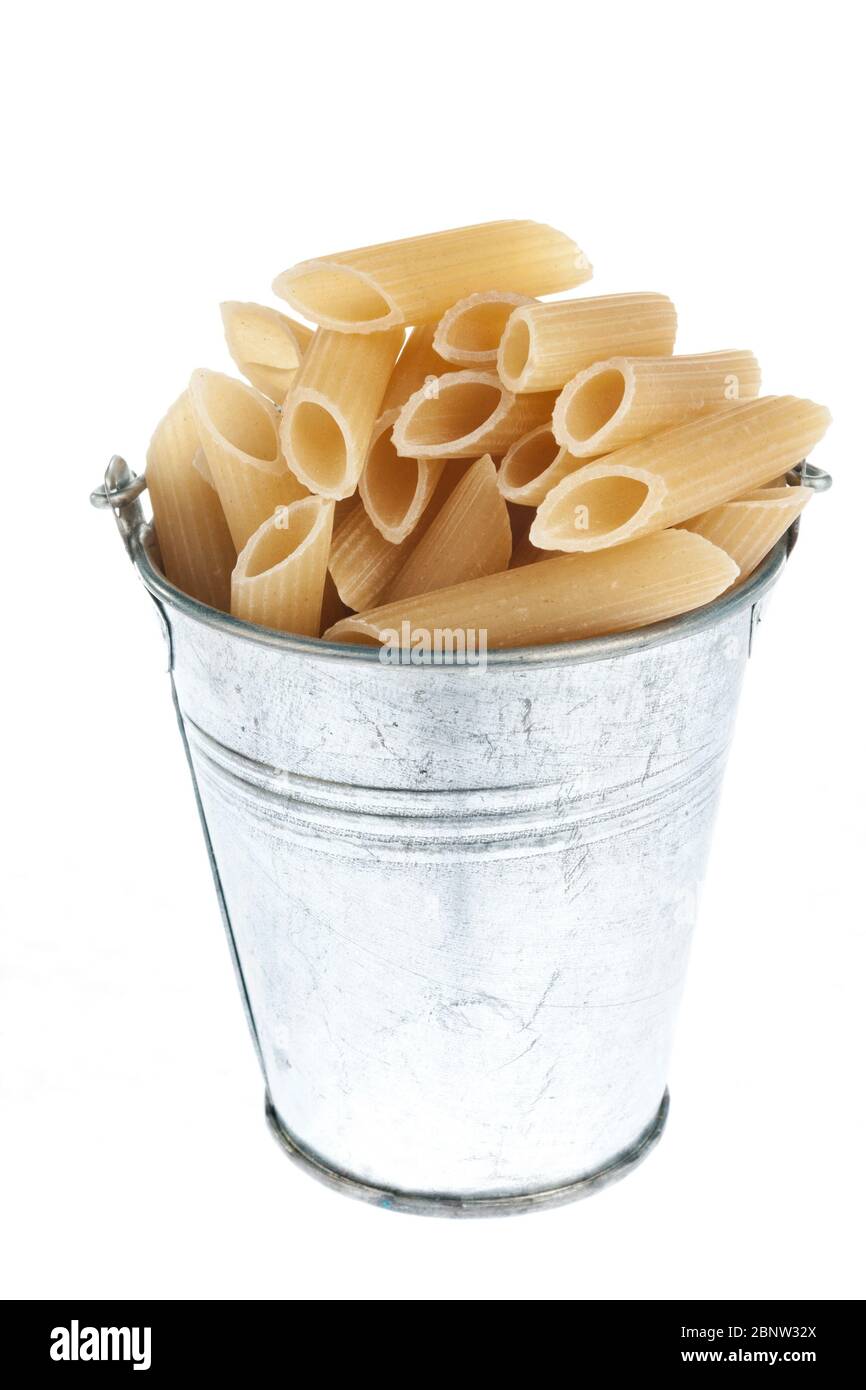 Full bucket of pasta on a white background. With place for text Stock ...