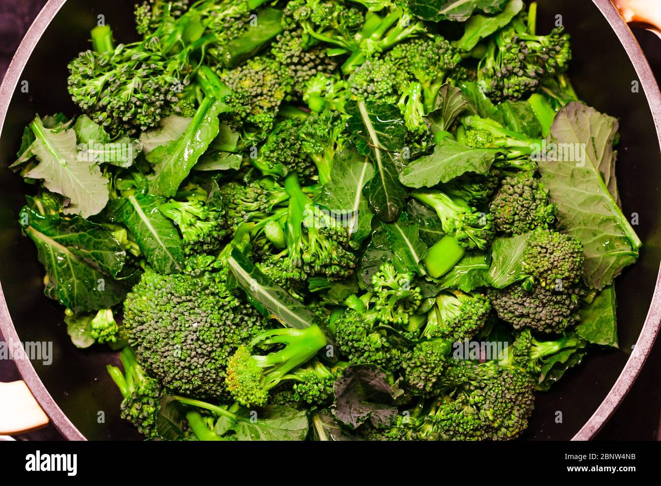 Green fresh broccoli in a pot. Vegan gluten free healthy food concept ...