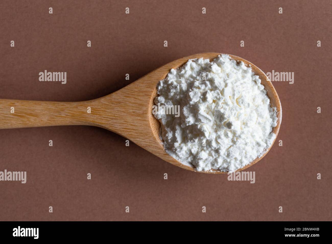Cornstarch on a Wood Spoon Stock Photo - Alamy