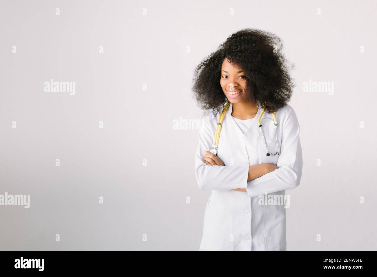 African doctor woman isolated on white background with a stethoscope ...