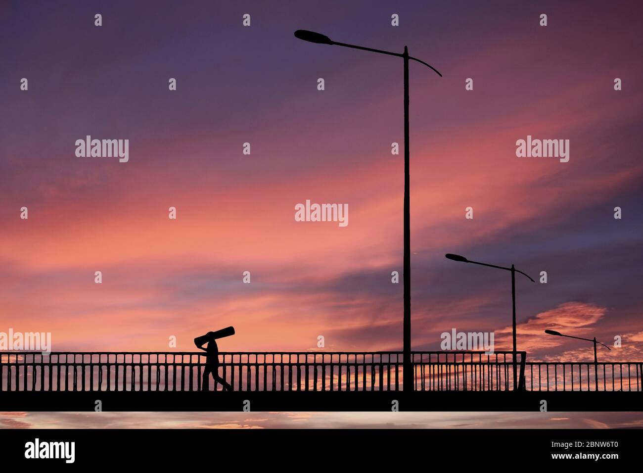 Silhouette of unknown city people walking across the overpass Stock ...