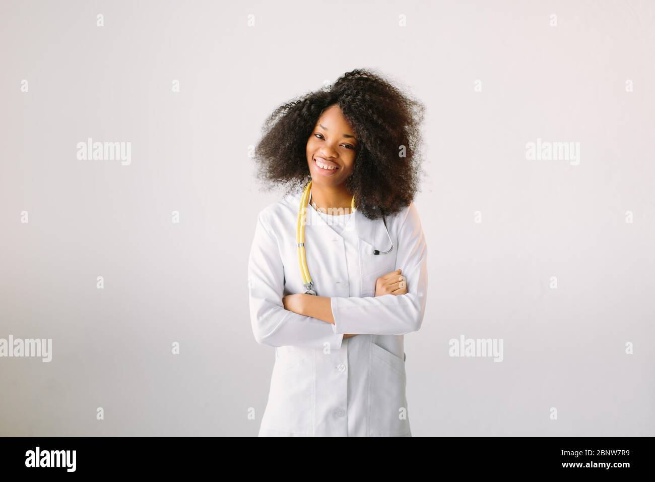Beautiful african american ethnic woman doctor isolated on white ... Beautiful african american ethnic woman doctor isolated on white ...