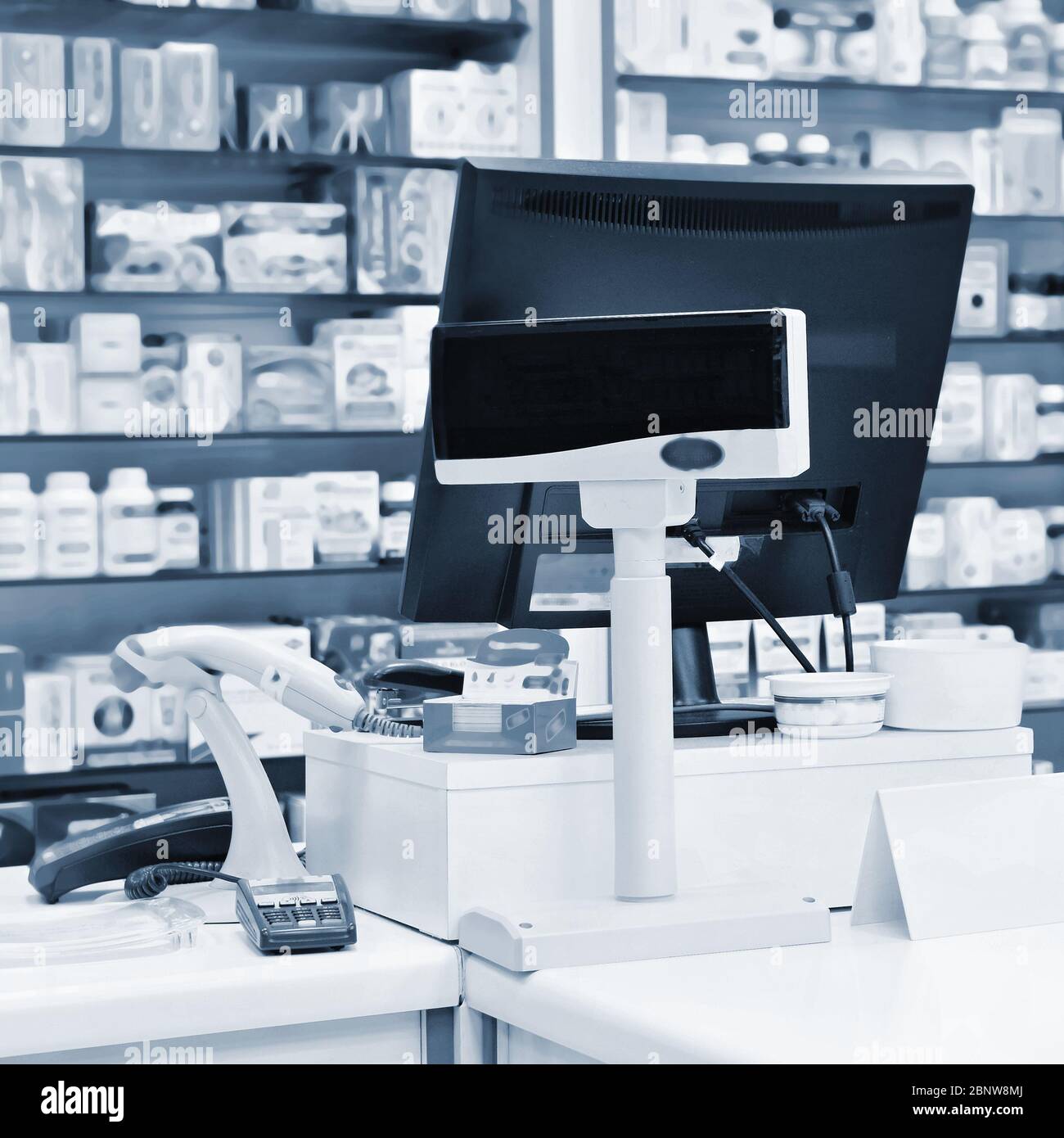 Cash desk - computer and monitor in a pharmacy. Interior of drug and ...