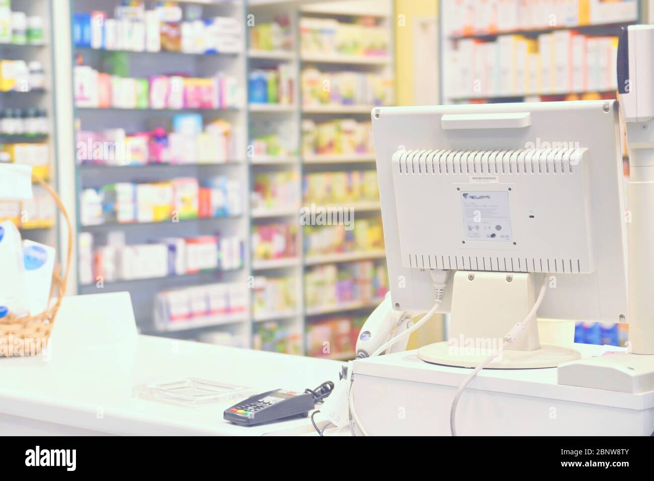 Cash desk - computer and monitor in a pharmacy. Interior of drug and ...