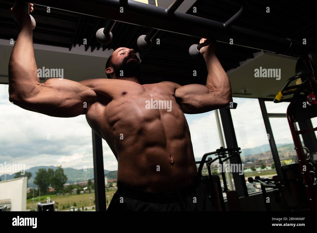 Bodybuilder Doing Pull Ups Best Back Exercises Stock Photo - Alamy