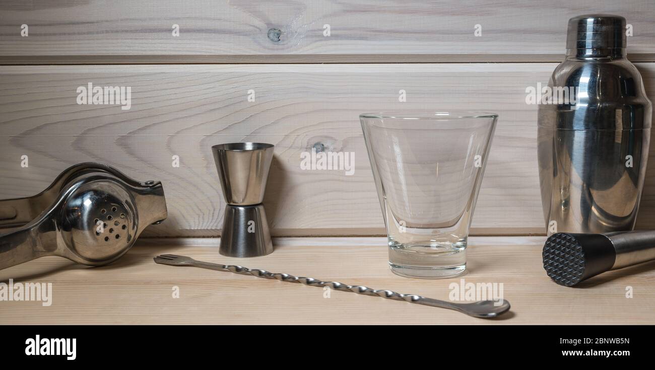 Professional bartender tools for making cocktails on wooden background ...