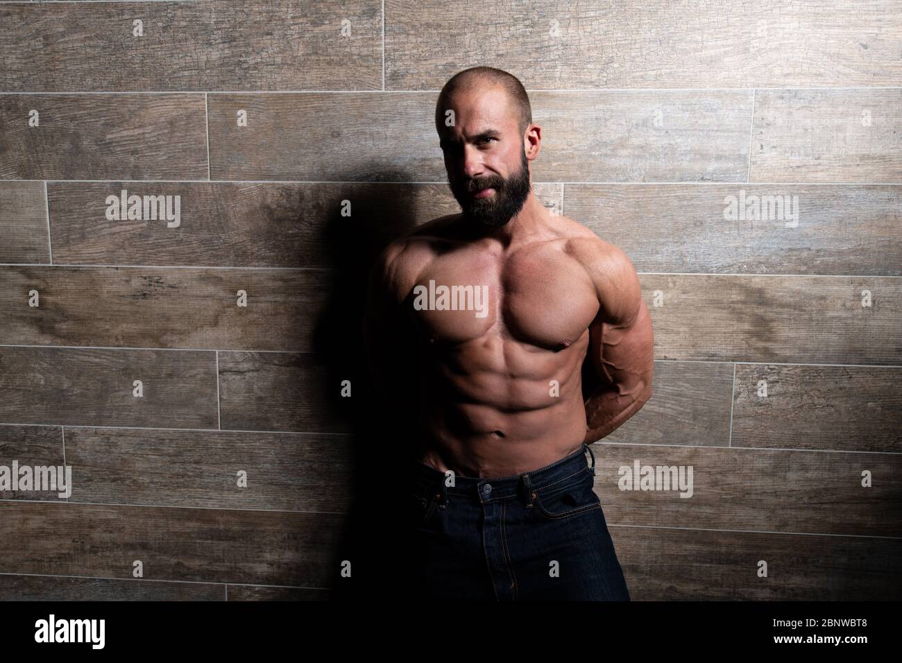 Portrait of a Young Physically Fit Man Showing His Well Trained Body ...