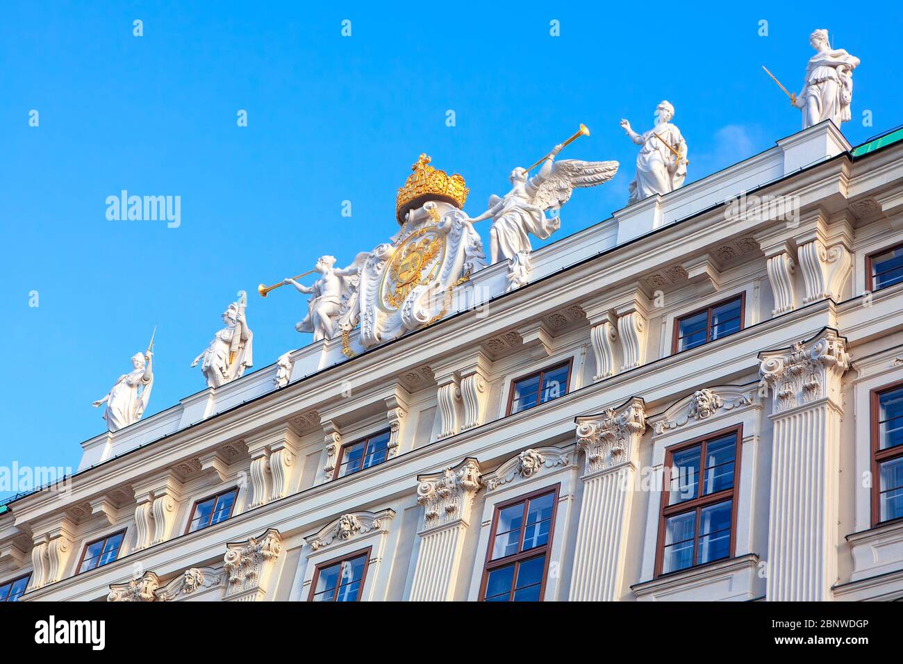 marble statues at building top in central Vienna Stock Photo - Alamy