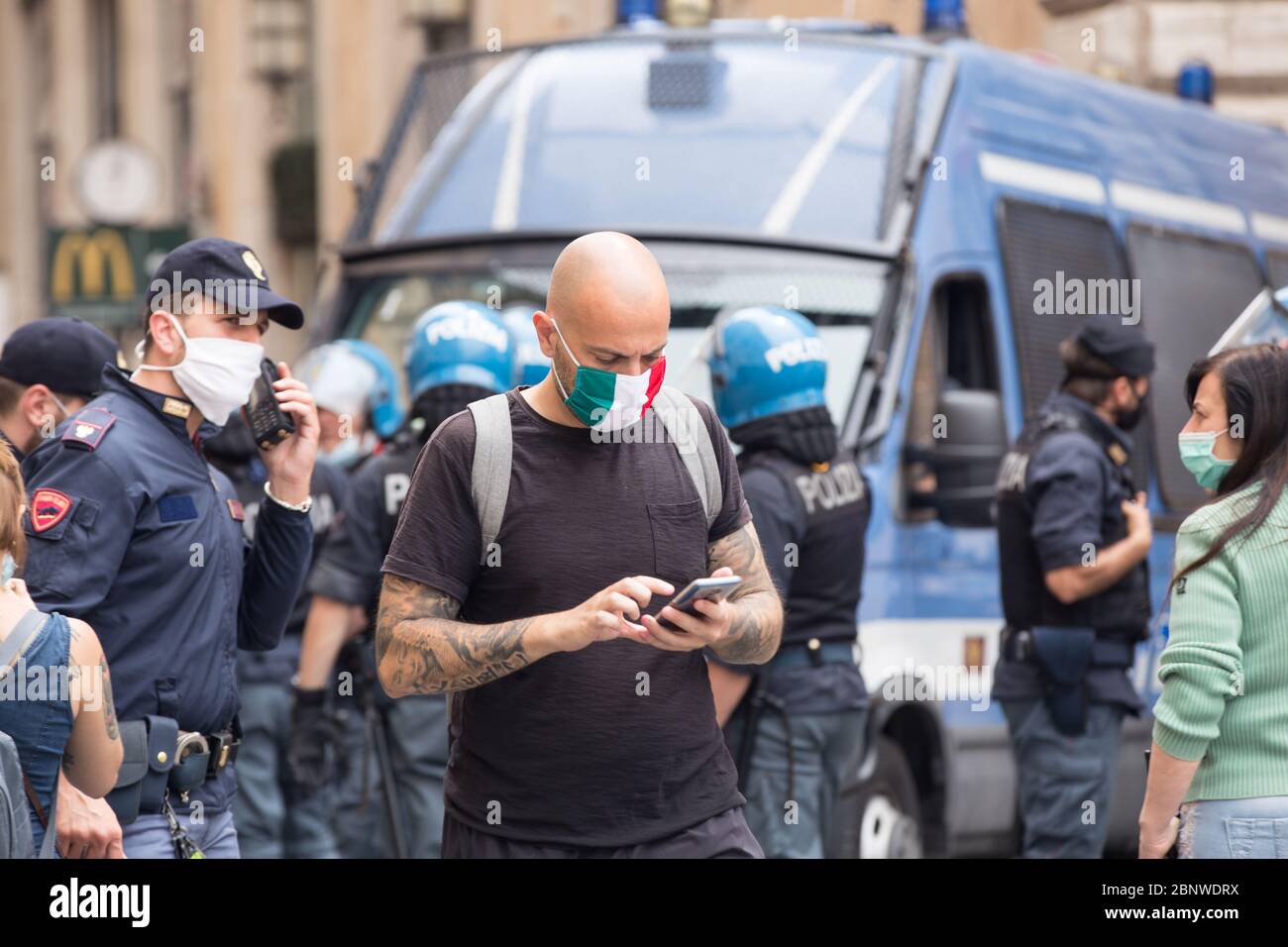 Roma, Italy. 16th May, 2020. Protesters with tricolor mask after the ...