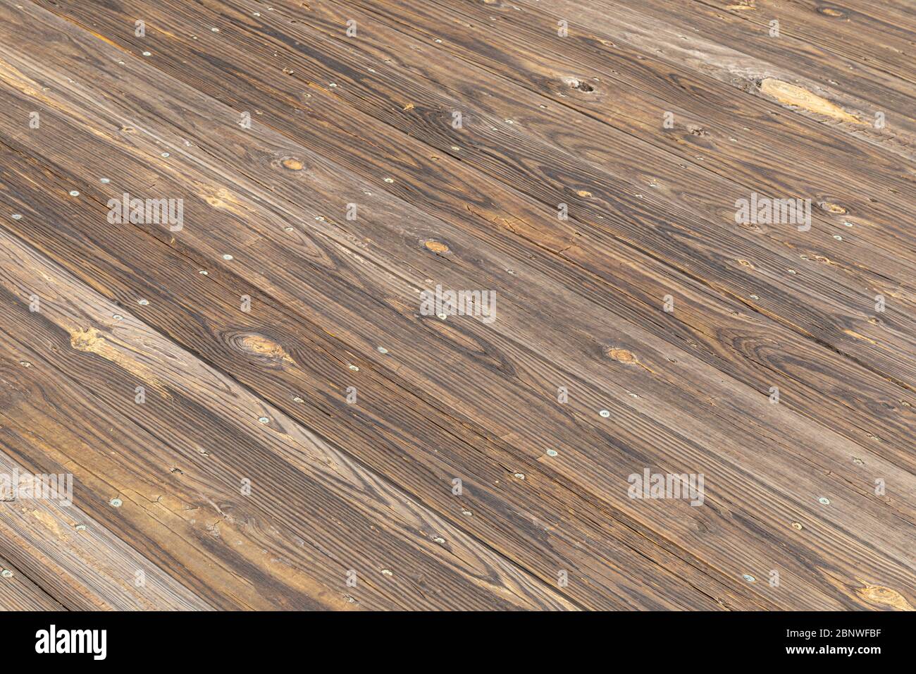 Treated wood planks boardwalk deck, diagonal view, horizontal aspect ...
