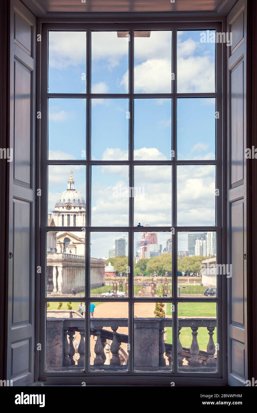 A view of Greenwich through a window of the Queen's House, London, UK ...