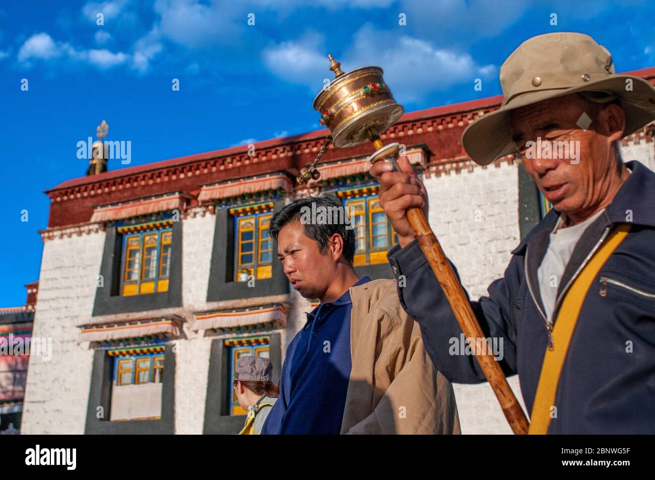 Tibetan buddhist devotees do the Kora clockwise circumambulation around ...