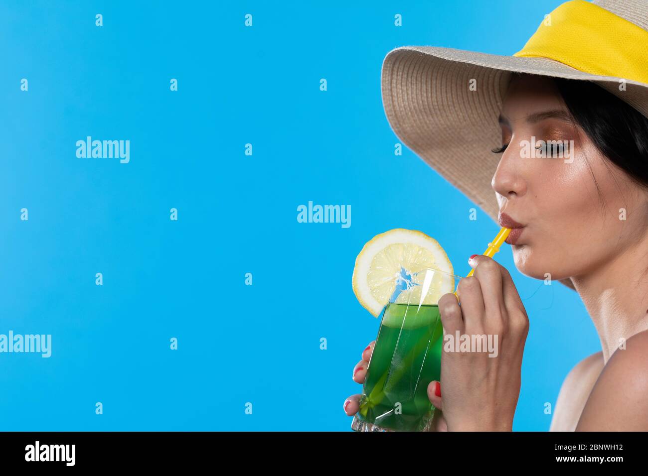 Sipping drink through straw hi-res stock photography and images - Alamy