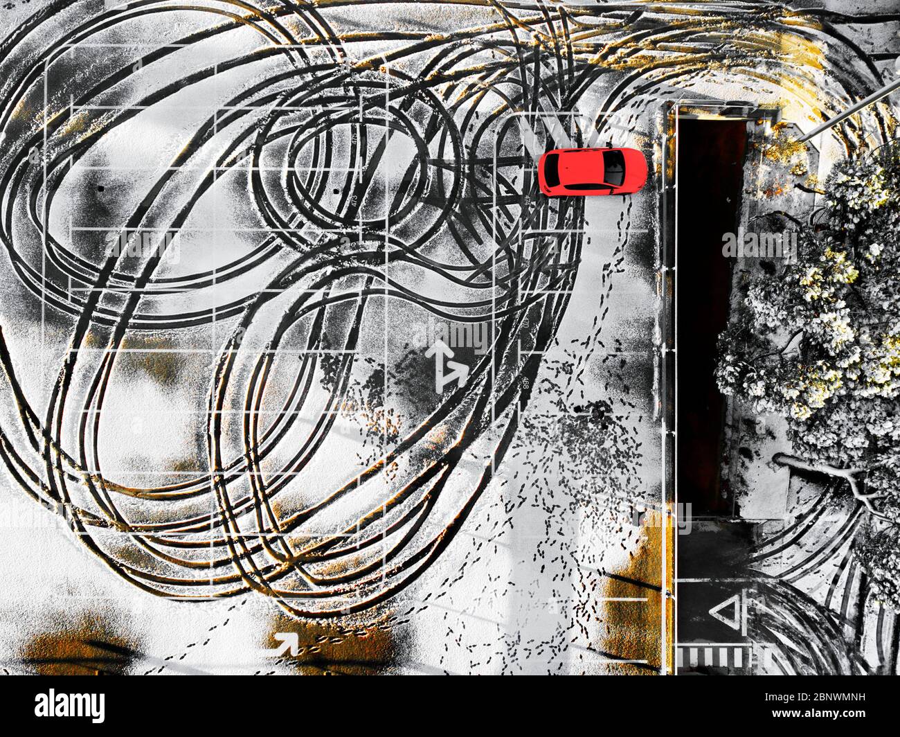 Car wheel marks in the snow aerial view in Tibidabo Collserola mountain ...