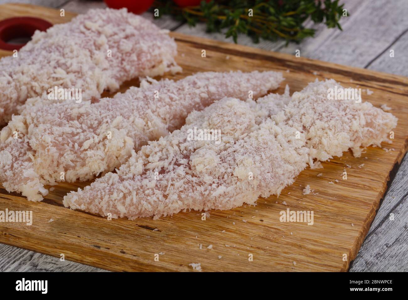 Raw chicken cutlet ready for cooking Stock Photo - Alamy