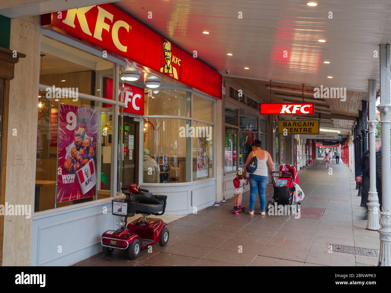 Llandudno, UK: Aug 27, 2019: A disability scooter is parked outside KFC ...