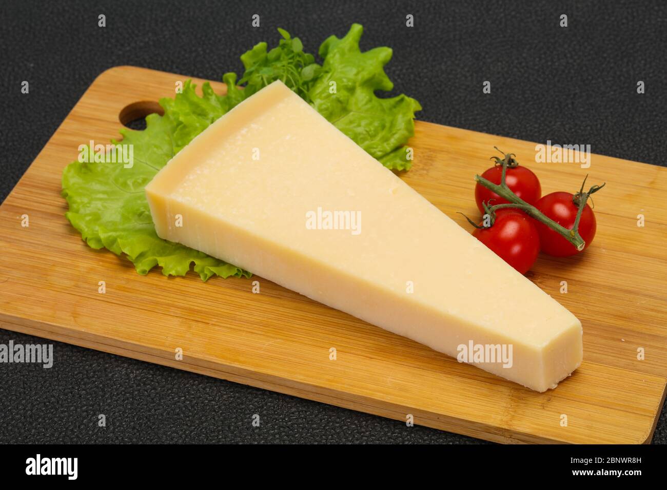 Italian traditional parmesan cheese triangle served salad Stock Photo ...