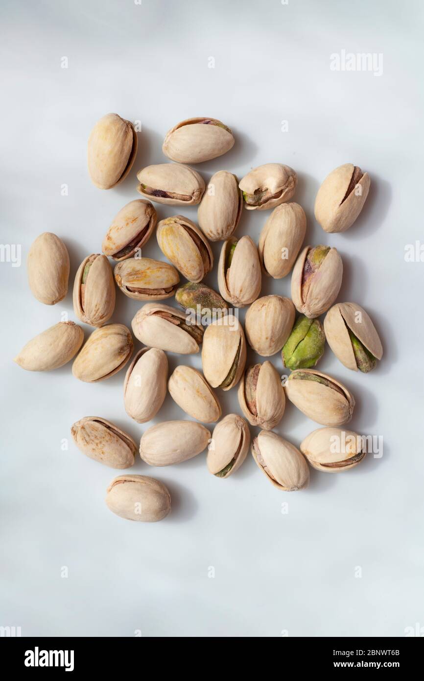 Food nut pistachios in shells roasted salted on white Stock Photo - Alamy