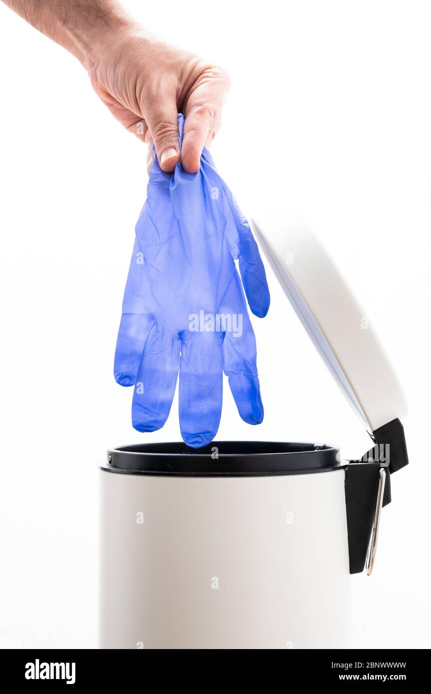 Hand glove throwing away hi-res stock photography and images - Alamy