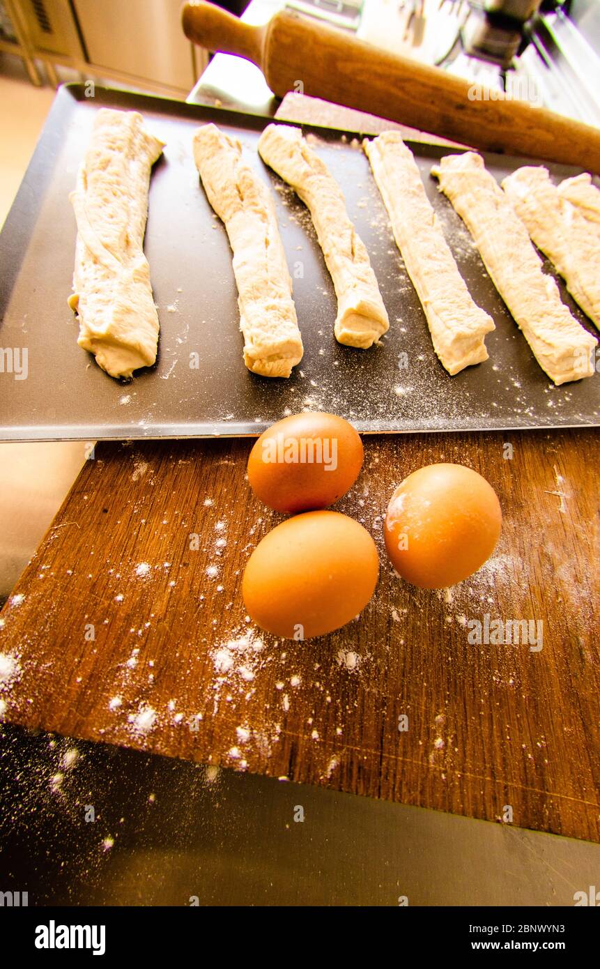 pastry dough kitchen table with eggs Stock Photo - Alamy