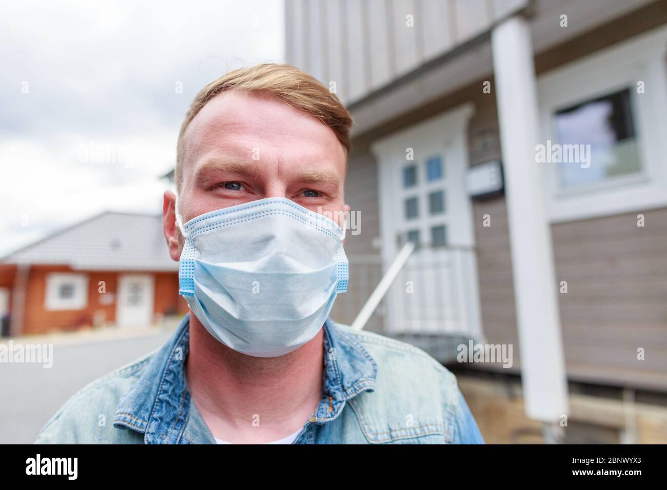 A young man with a protection mask Stock Photo - Alamy