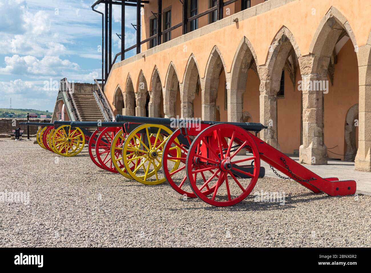 Courtyard Eger Castle with building and medieval field guns Stock Photo ...