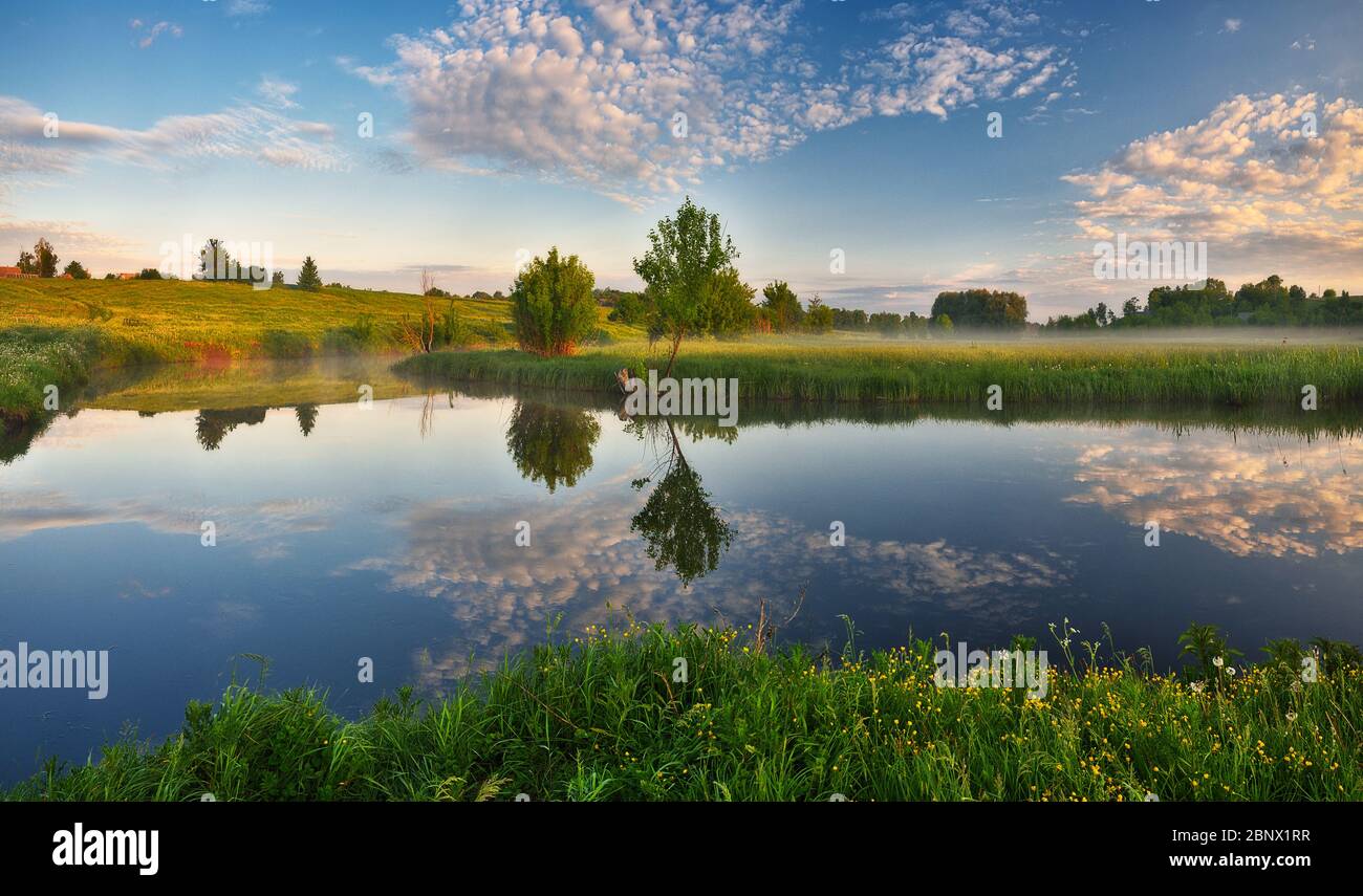Vivid spring sunrise. Spring landscape of dawn over river Stock Photo ...