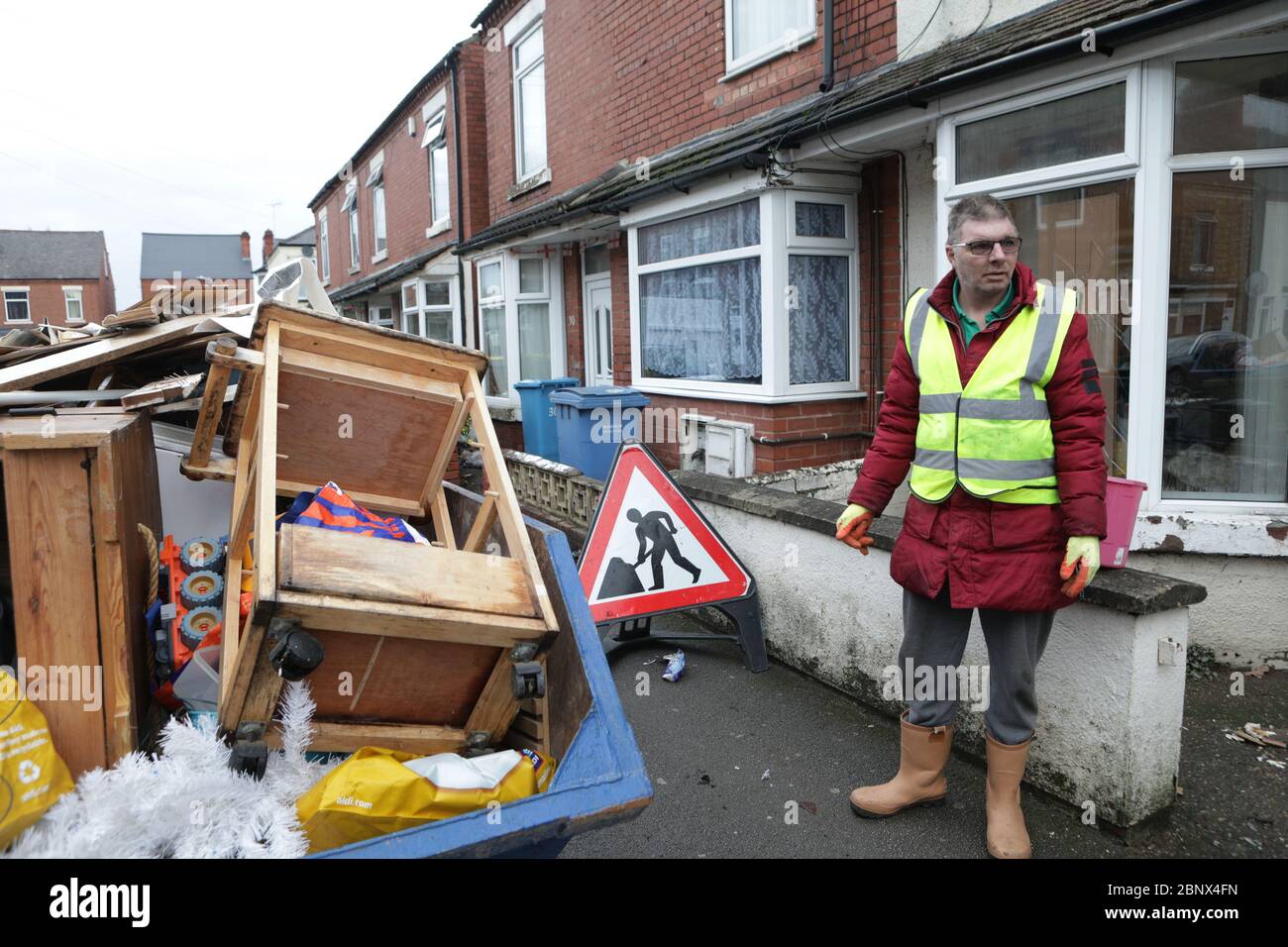 A member of Worksop Christian Community helping the clear up from the ...