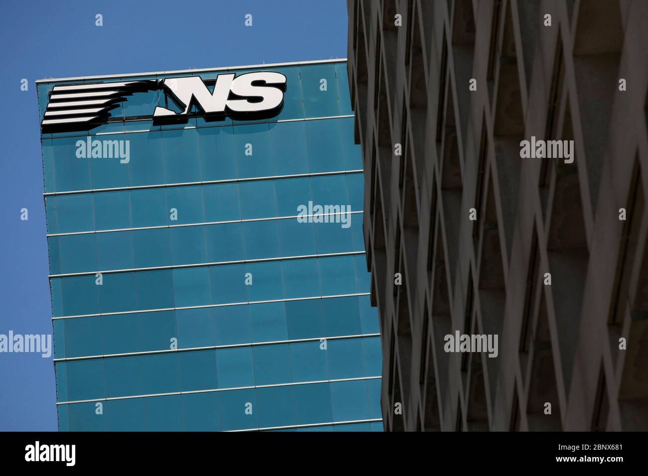 A logo sign outside of the headquarters of The Norfolk Southern Railway ...