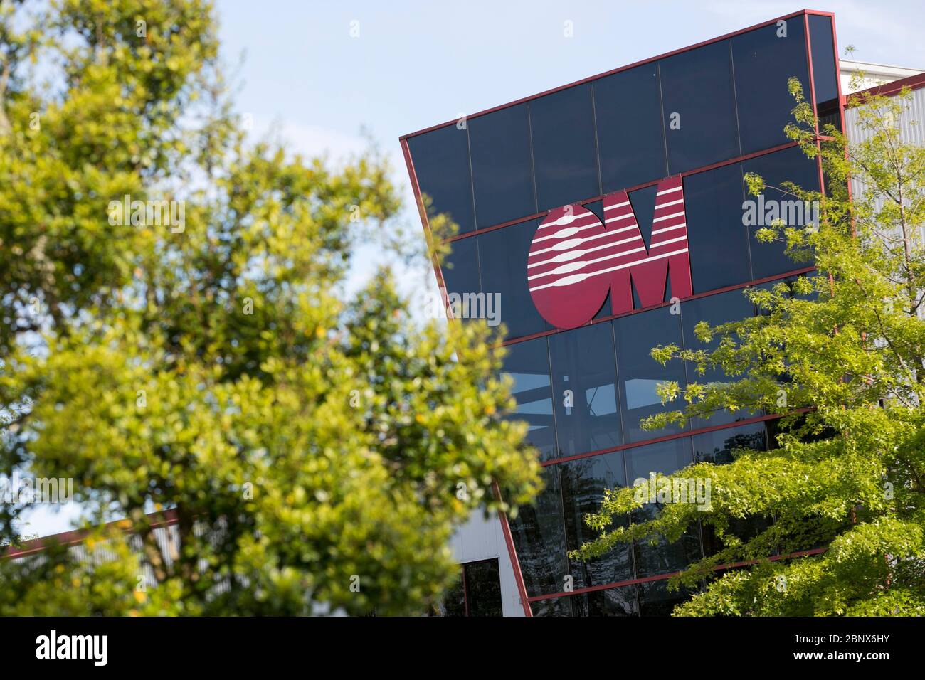 A logo sign outside of a facility occupied by Owens & Minor in Toano ...