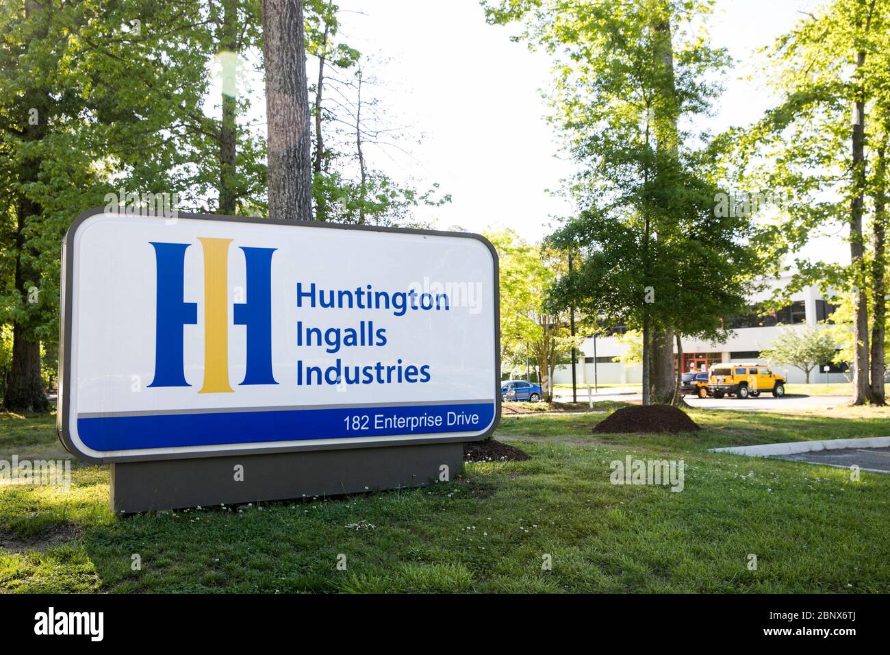 A logo sign outside of a facility occupied by Huntington Ingalls ...