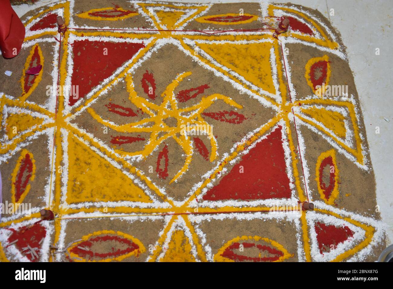 Beautiful Rangoli made in Indian wedding pavilion Stock Photo - Alamy
