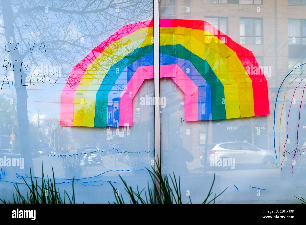 Rainbow of hope drawing on a window in Montreal Canada during the ...