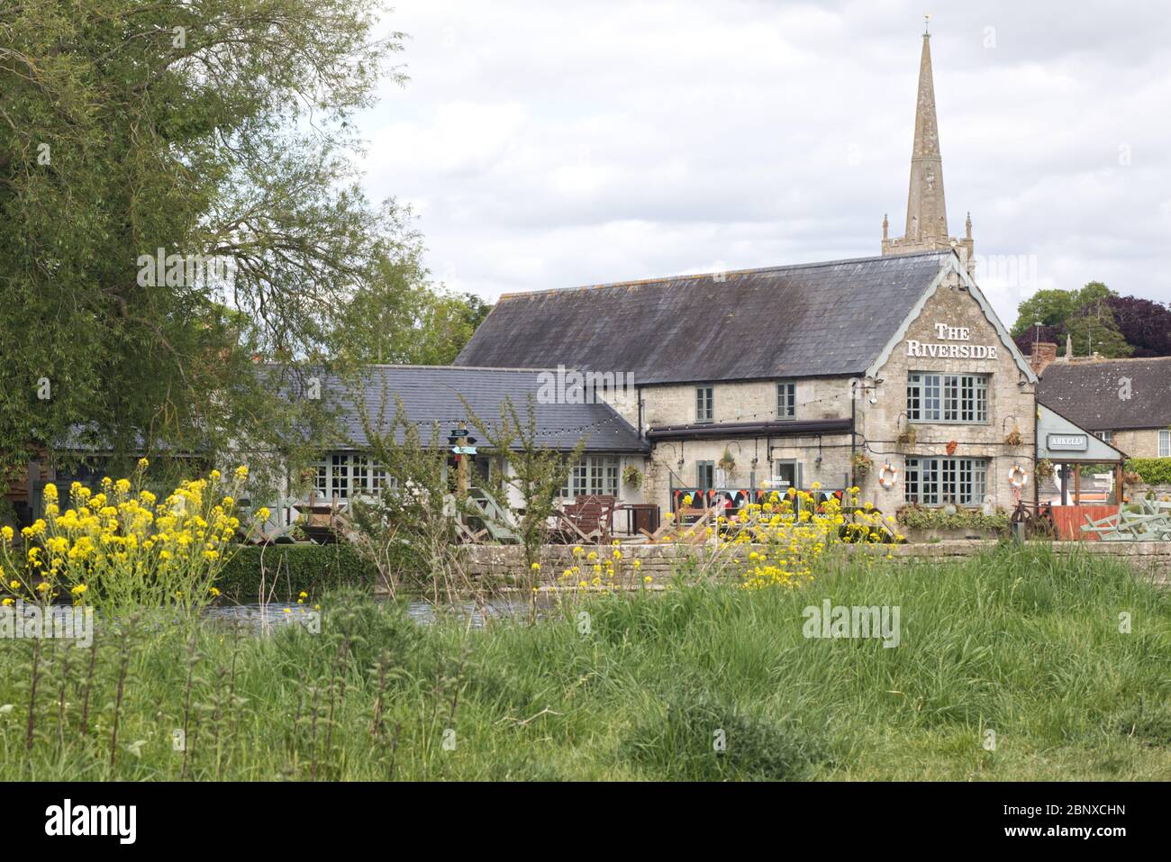 The riverside and church steeple, Lechlade, town at the southern edge ...