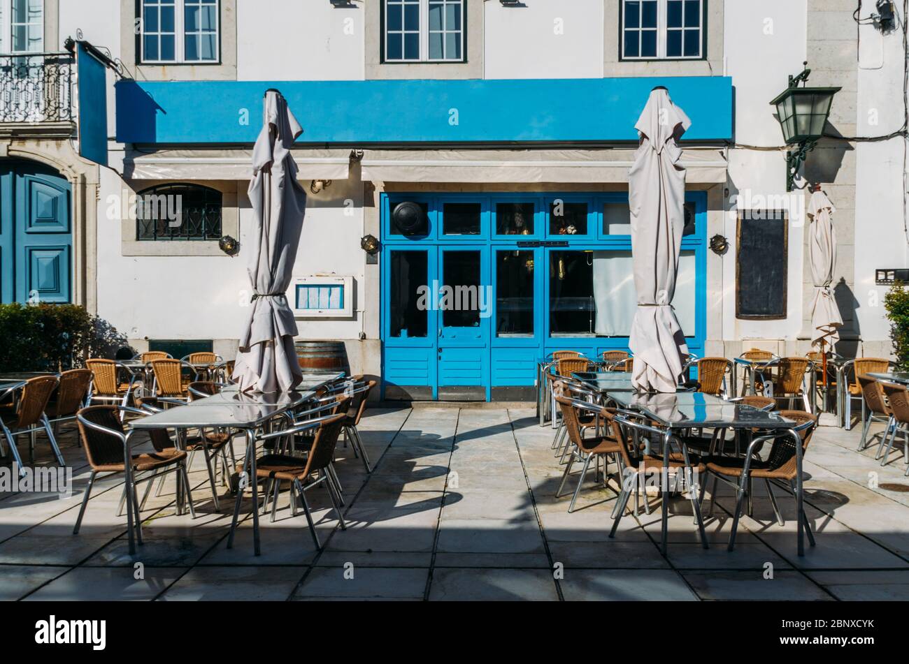Empty outdoor restaurant terrace space with plenty of space between ...