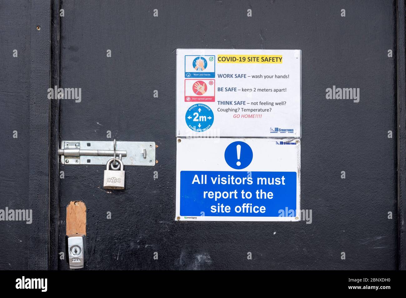 Construction COVID-19 site safety warning sign during Coronavirus ...