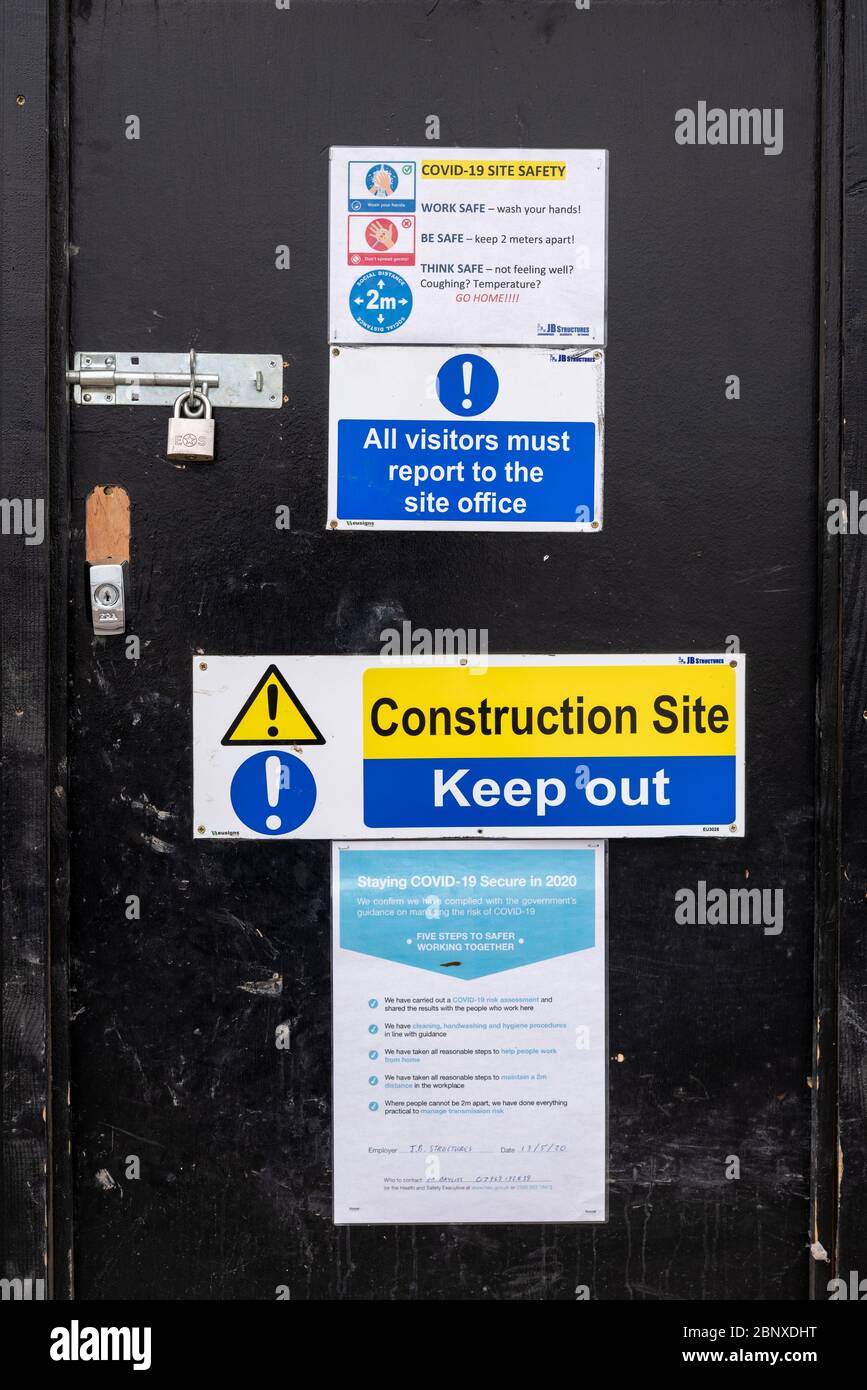 Construction COVID-19 site safety warning sign during Coronavirus ...